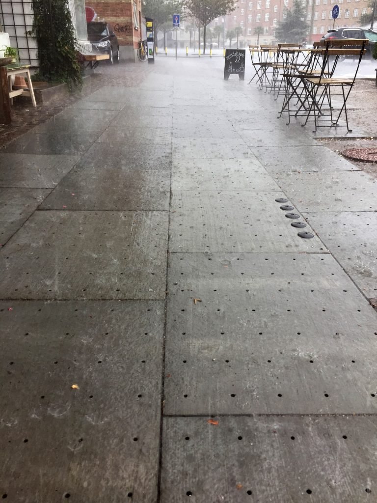 Rain-Proof Tiles Keep Copenhagen’s Sidewalks Dry — Pop-Up City